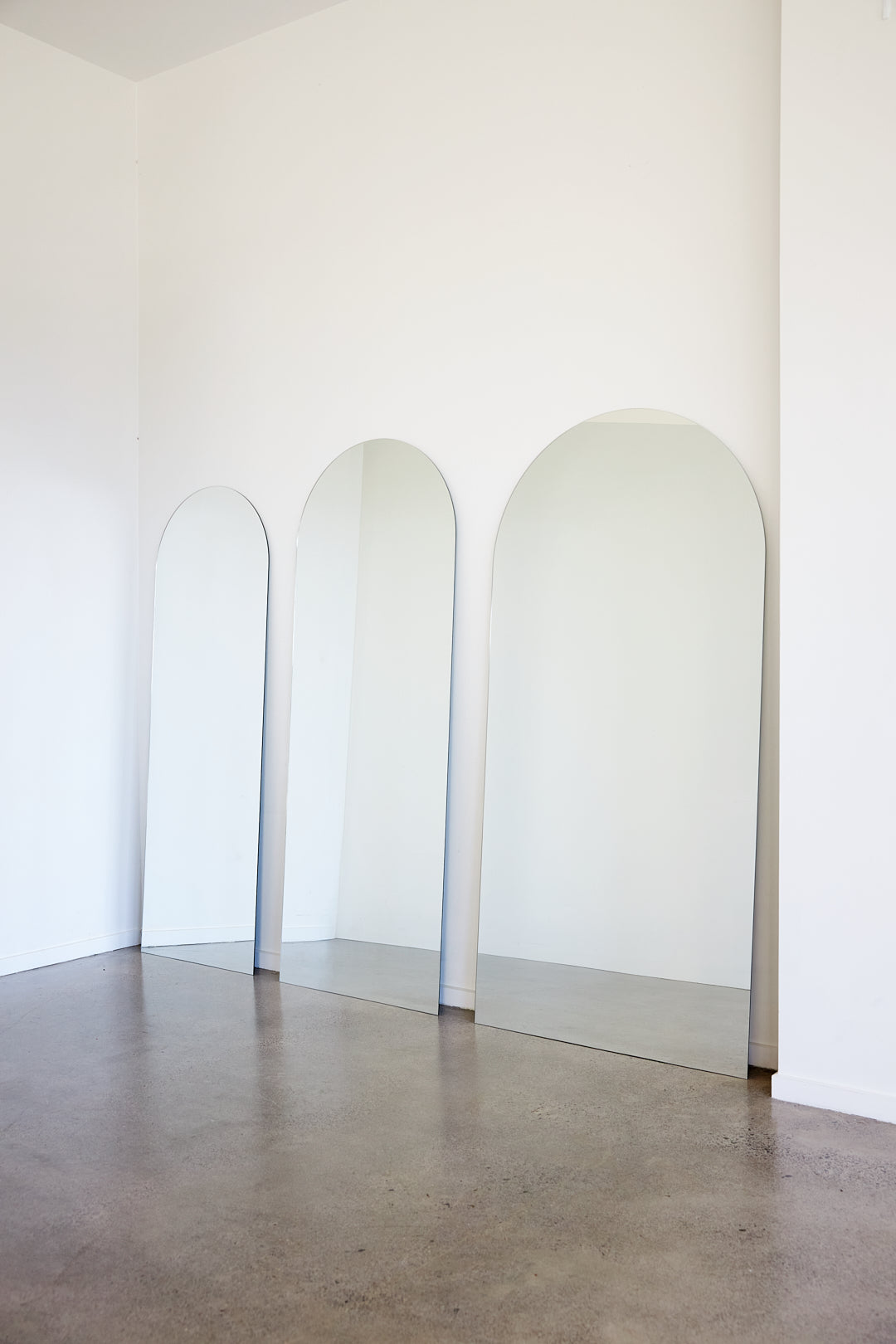 Bow Mirrors frameless arch mirrors